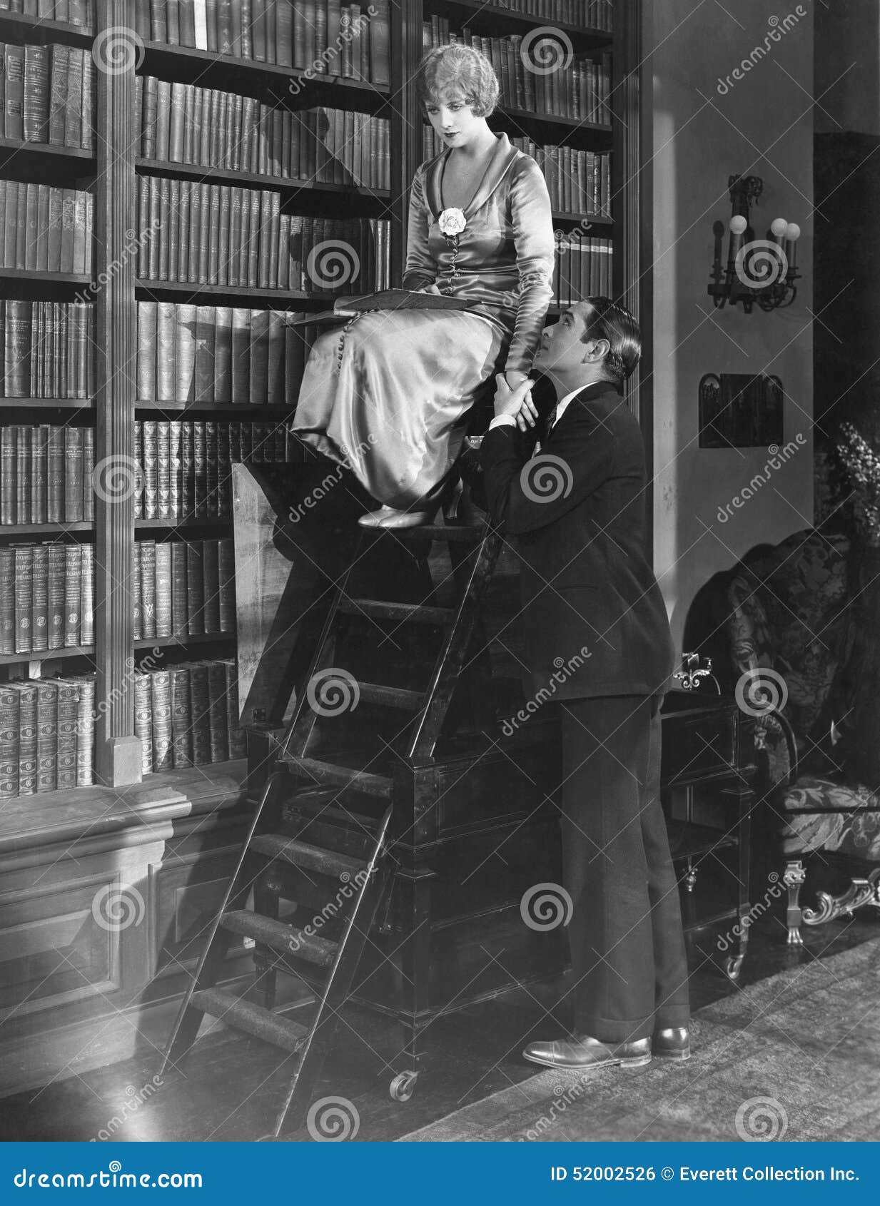 Man with Woman on Ladder in Library Stock Photo - Image of black, 2030: ...