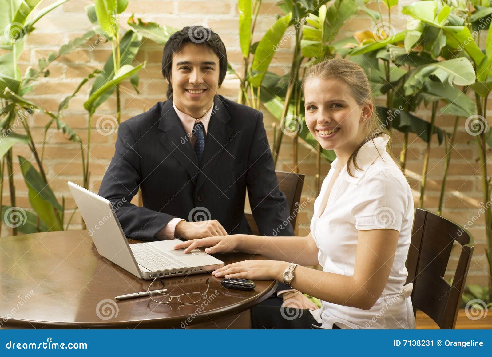 Man and Woman with Laptop stock image. Image of female - 7138231