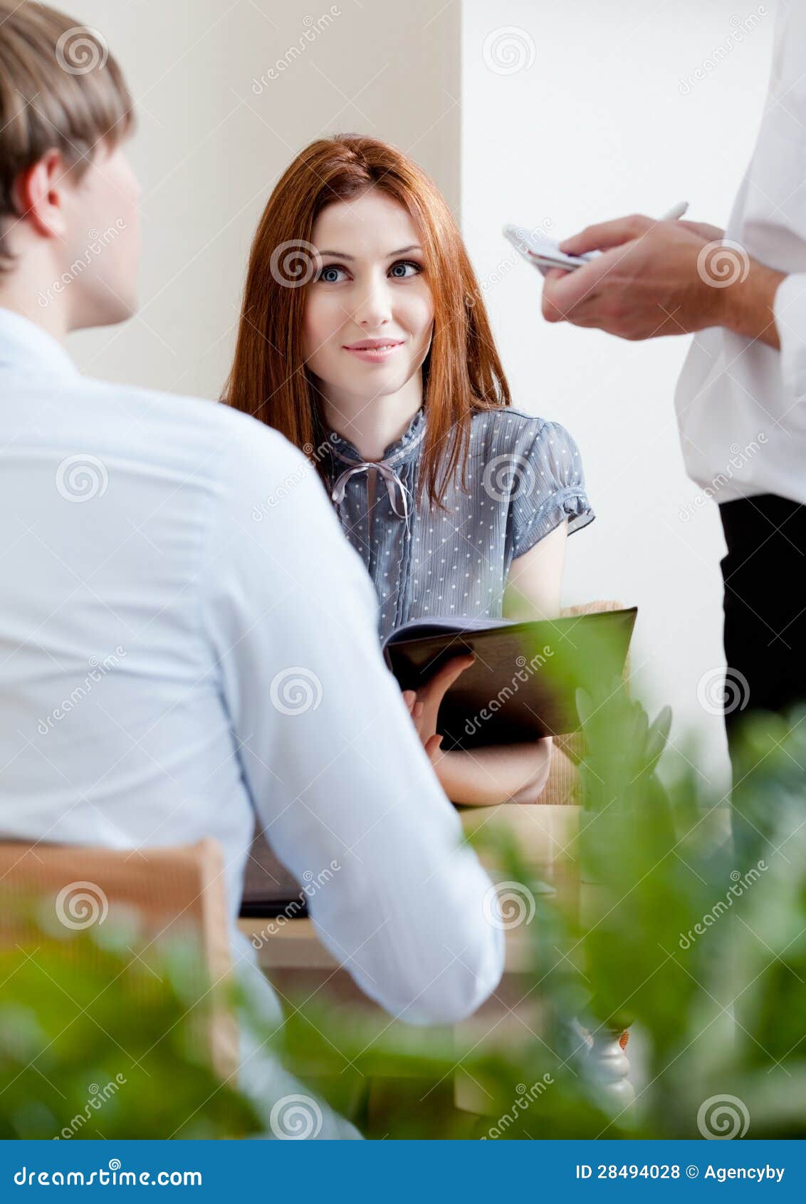 Man and Woman Make the Order at the Cafe Stock Photo - Image of ...