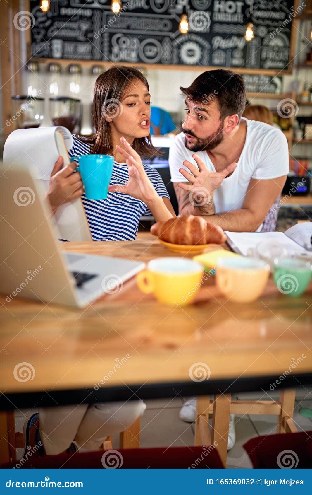 Man and woman making plans stock photo. Image of apron - 165369032