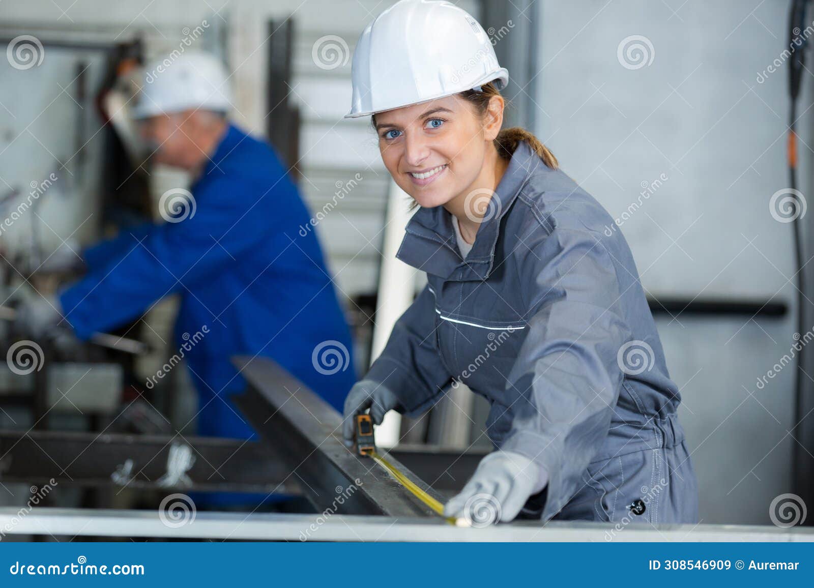 Man and Woman Measuring Length Metal in Workshop Stock Image - Image of ...
