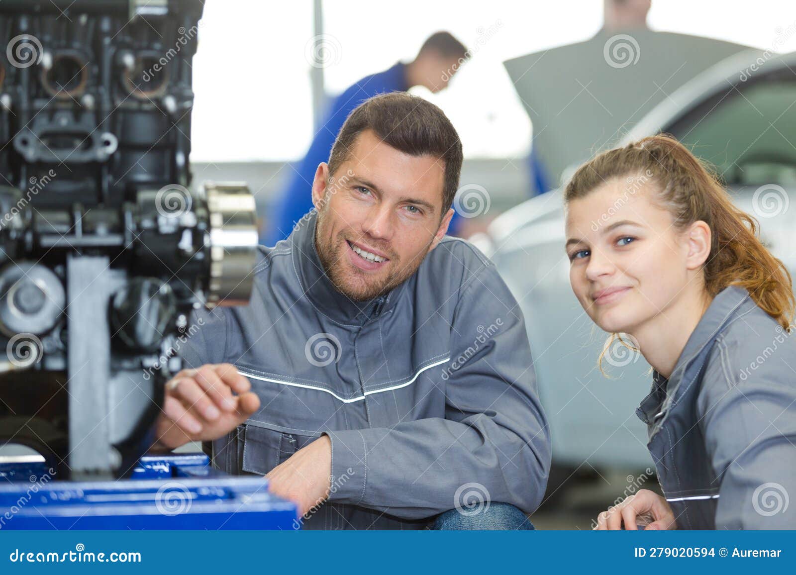 Man and Woman Mechanics in Car Workshop Stock Photo - Image of female ...