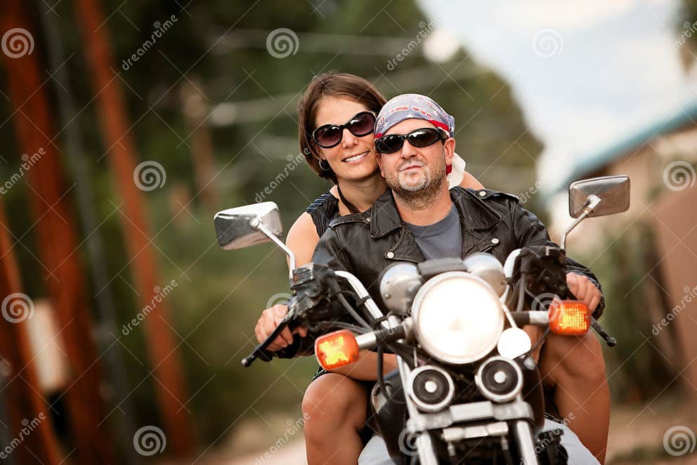 Man and Woman on Motorcycle Stock Image - Image of road, happy: 11100337