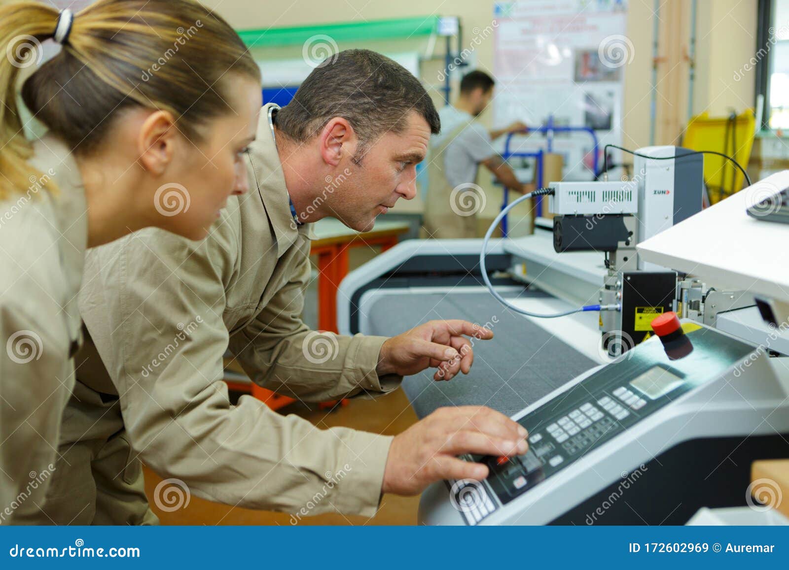 Man and Woman Operating with Machine Stock Image - Image of specialist ...