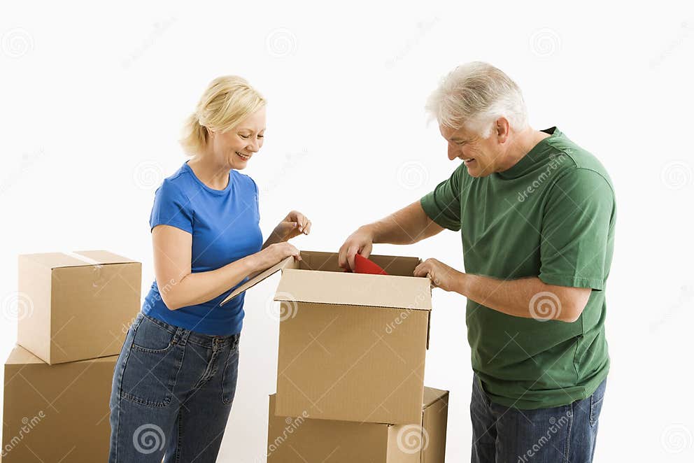 Man and woman packing. stock image. Image of caucasian - 6153543