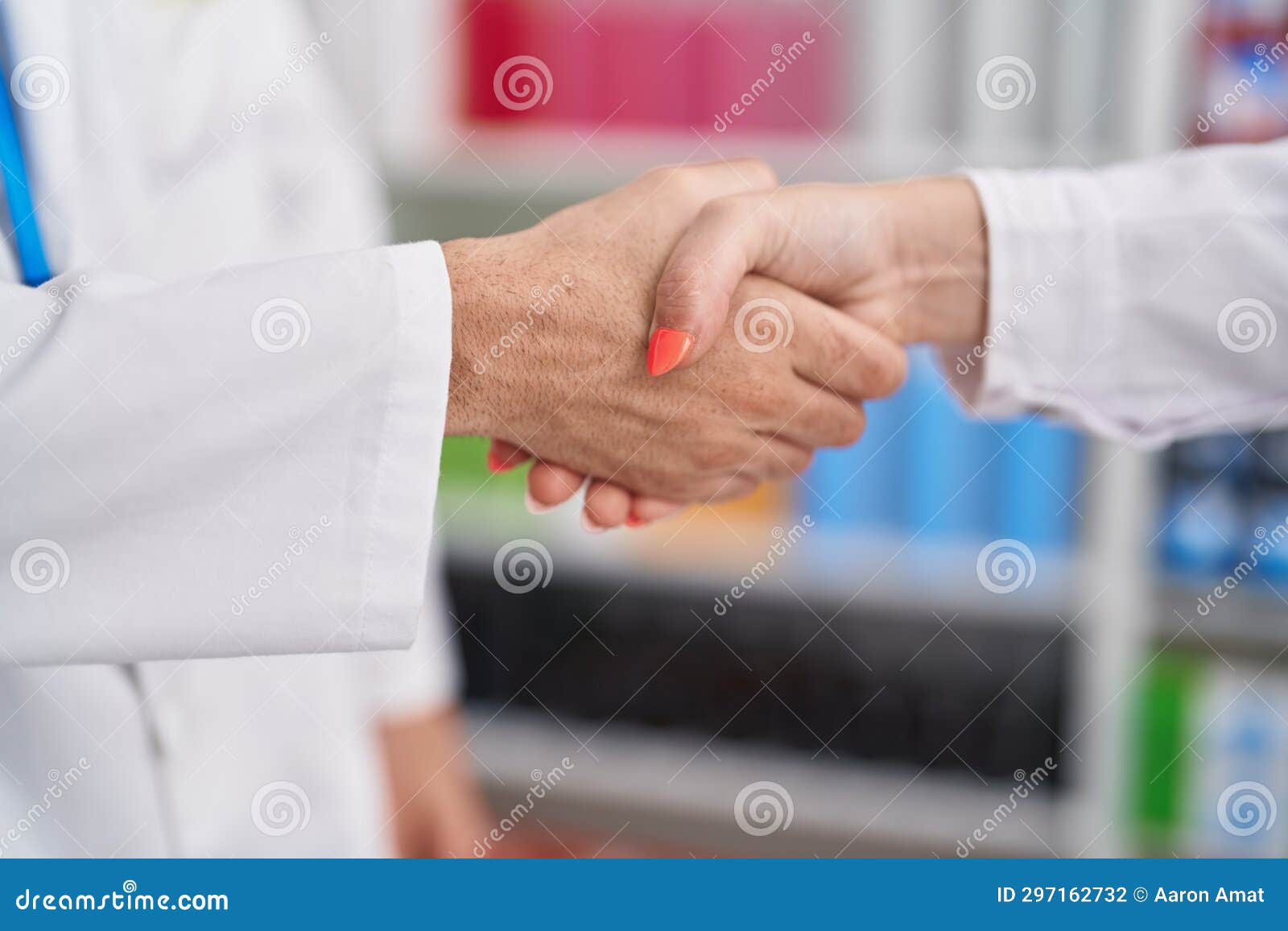 Man and Woman Pharmacists Shake Hands at Pharmacy Stock Photo - Image ...