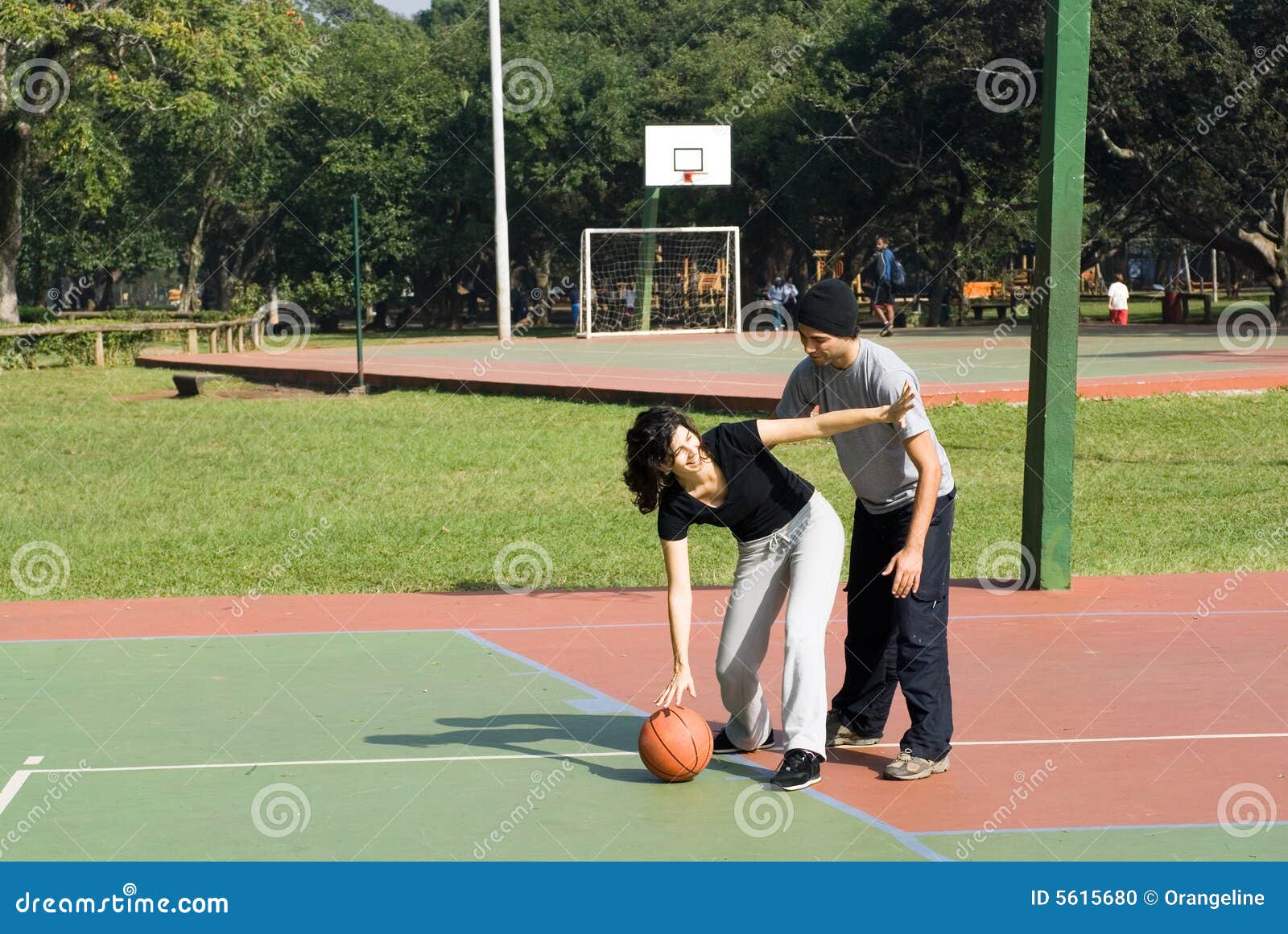 Man and Woman Playing Basketball - Horizontal Stock Photo - Image of ...