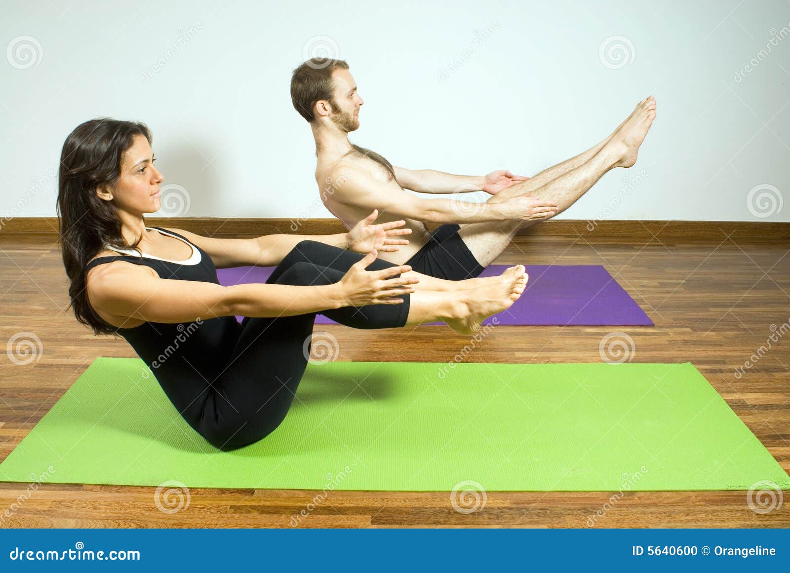 Man and Woman Practice Yoga - Horizontal Stock Photo - Image of mates ...