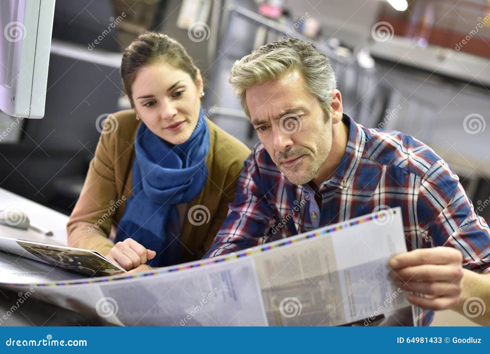 Man and Woman in Printing House Checking Print Quality Stock Image ...