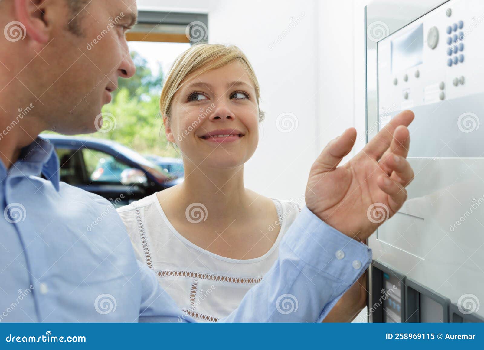 Man and Woman Push Down Electronic Control Machine Stock Image - Image ...