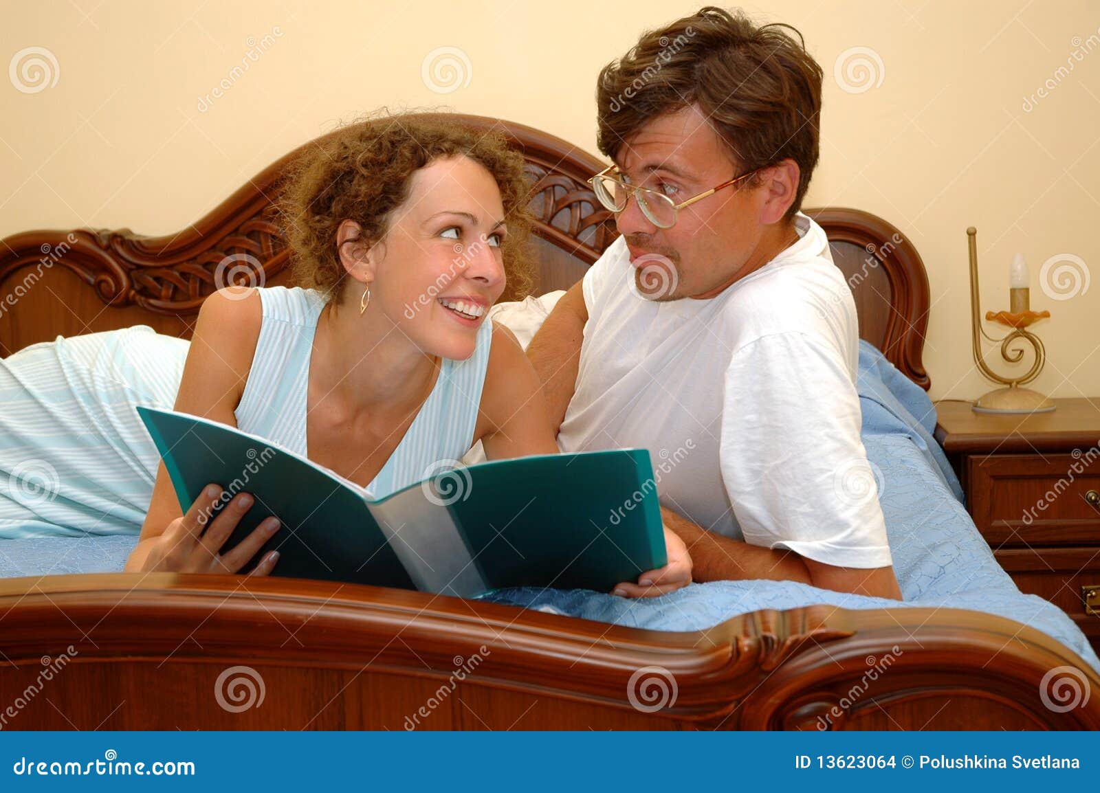 Man and woman read stock photo. Image of young, learning - 13623064