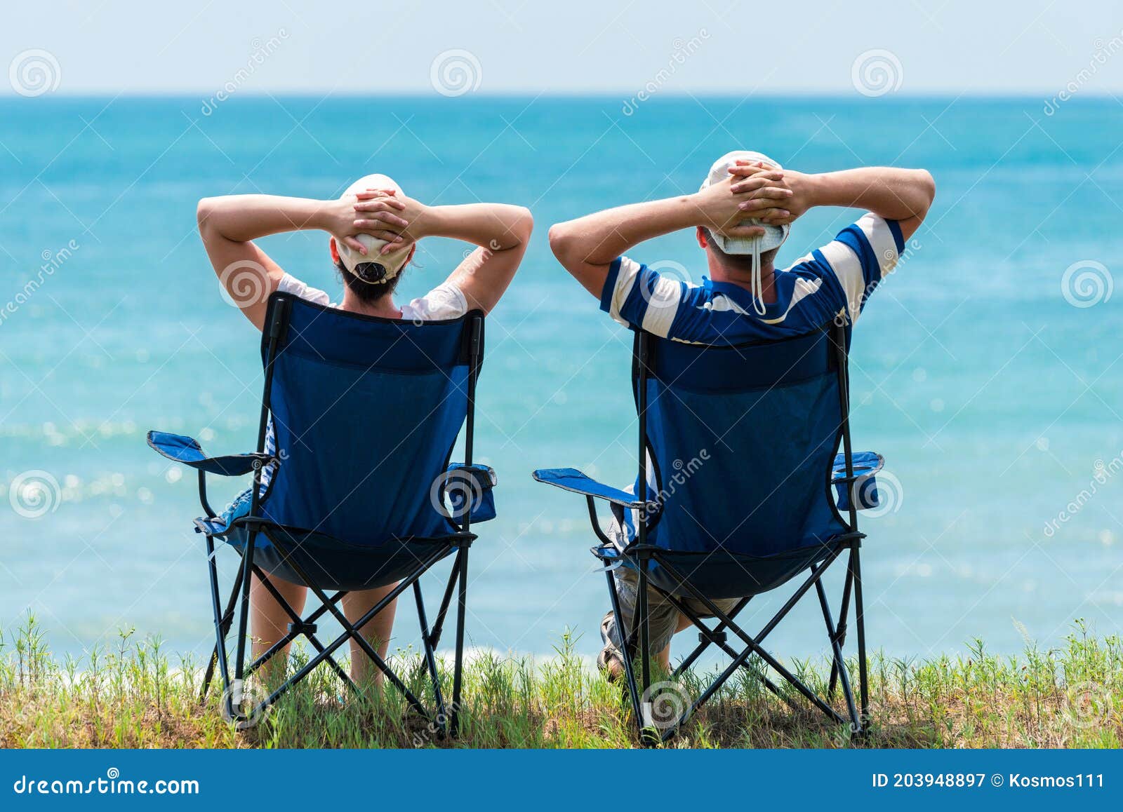 Man and Woman Relax and Unwind in Camping Chairs Stock Image - Image of ...