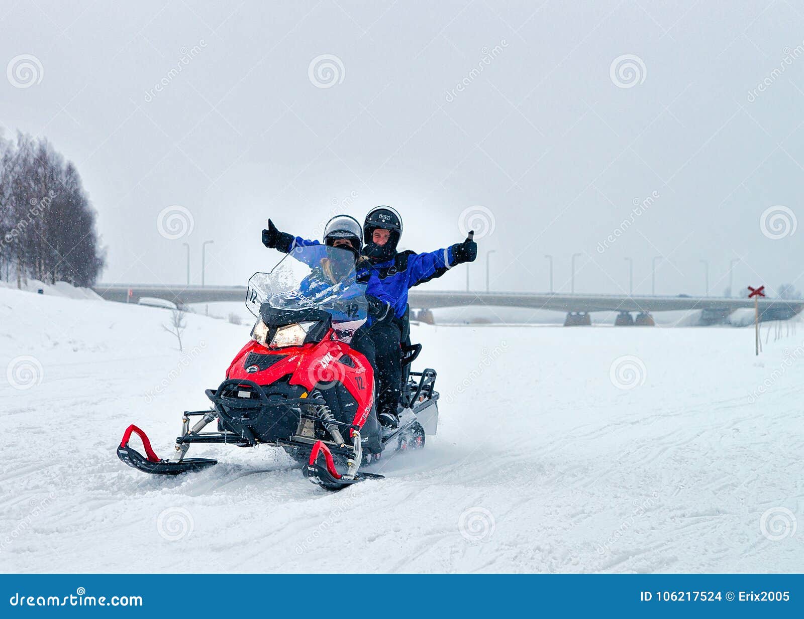 Man and Woman Riding Snowmobile in Winter Rovaniemi Editorial Stock ... Man and Woman Riding Snowmobile in Winter Rovaniemi Editorial Stock ...