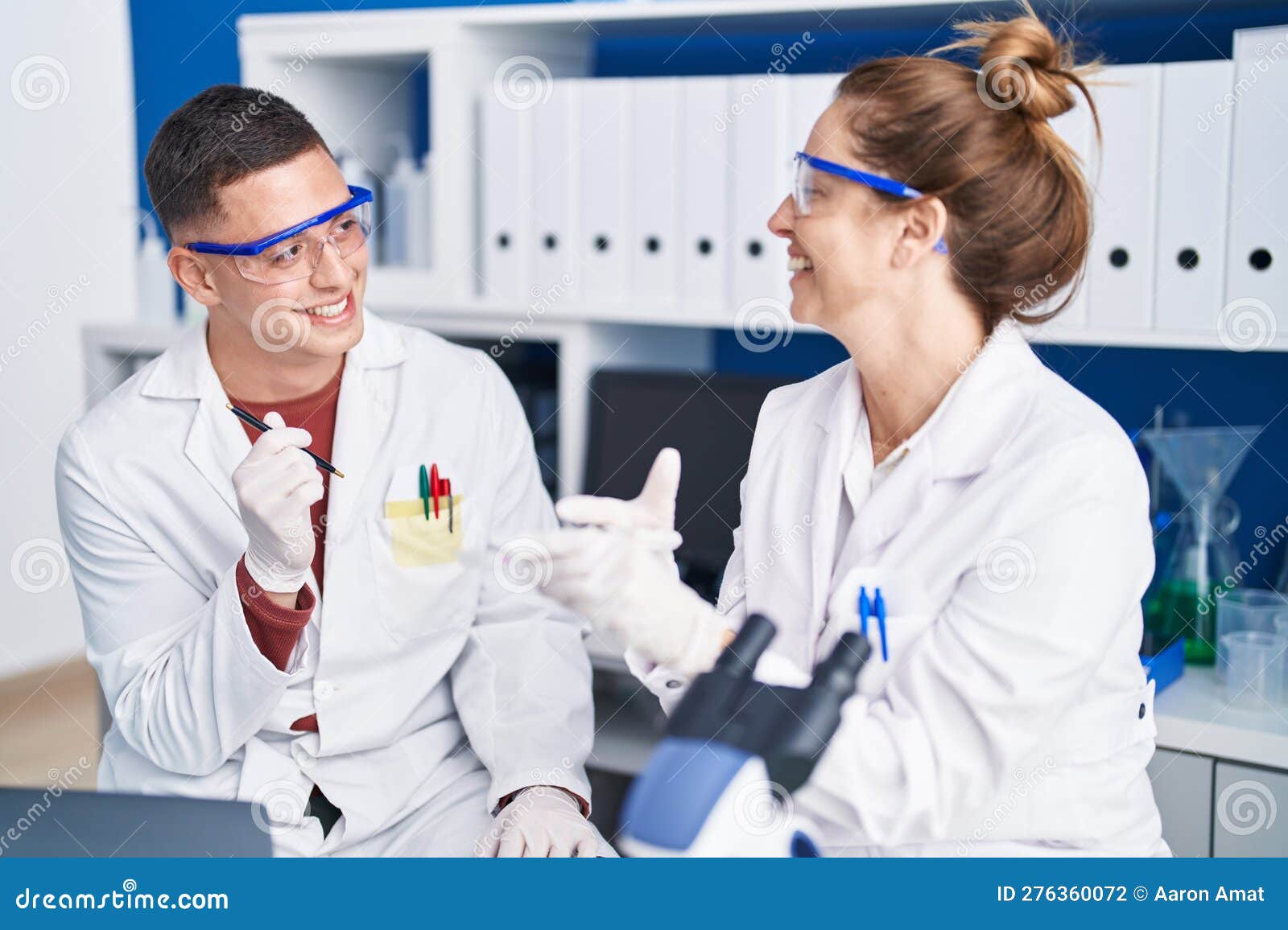 Man and Woman Scientists Looking Sample at Laboratory Stock Photo ...