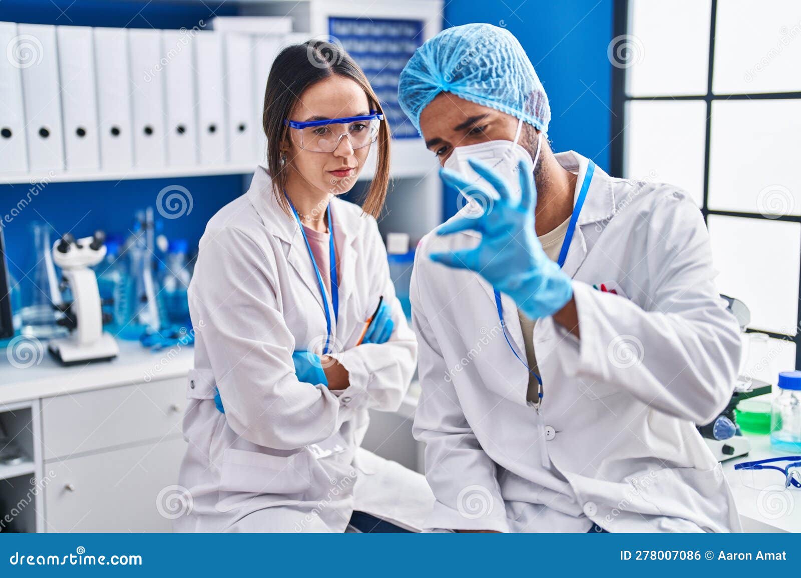 Man and Woman Scientists Looking Sample at Street Stock Photo - Image ...