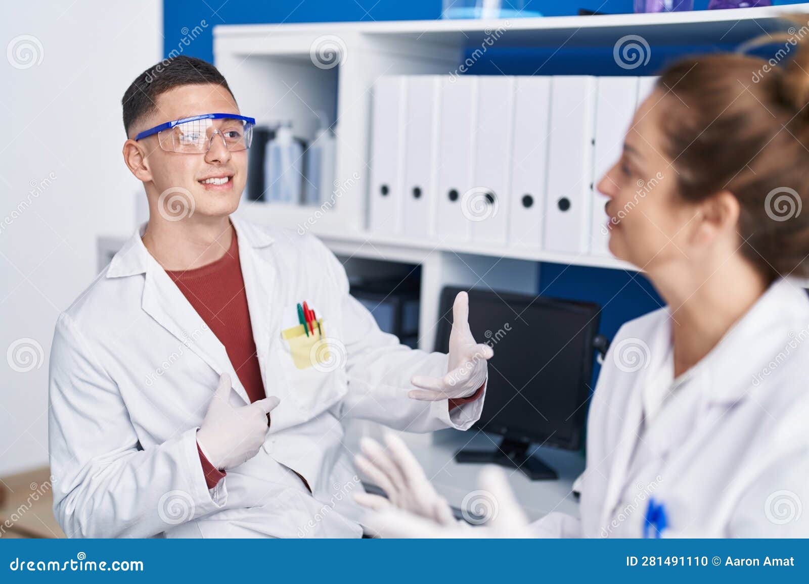 Man and Woman Scientists Speaking at Laboratory Stock Photo - Image of ...