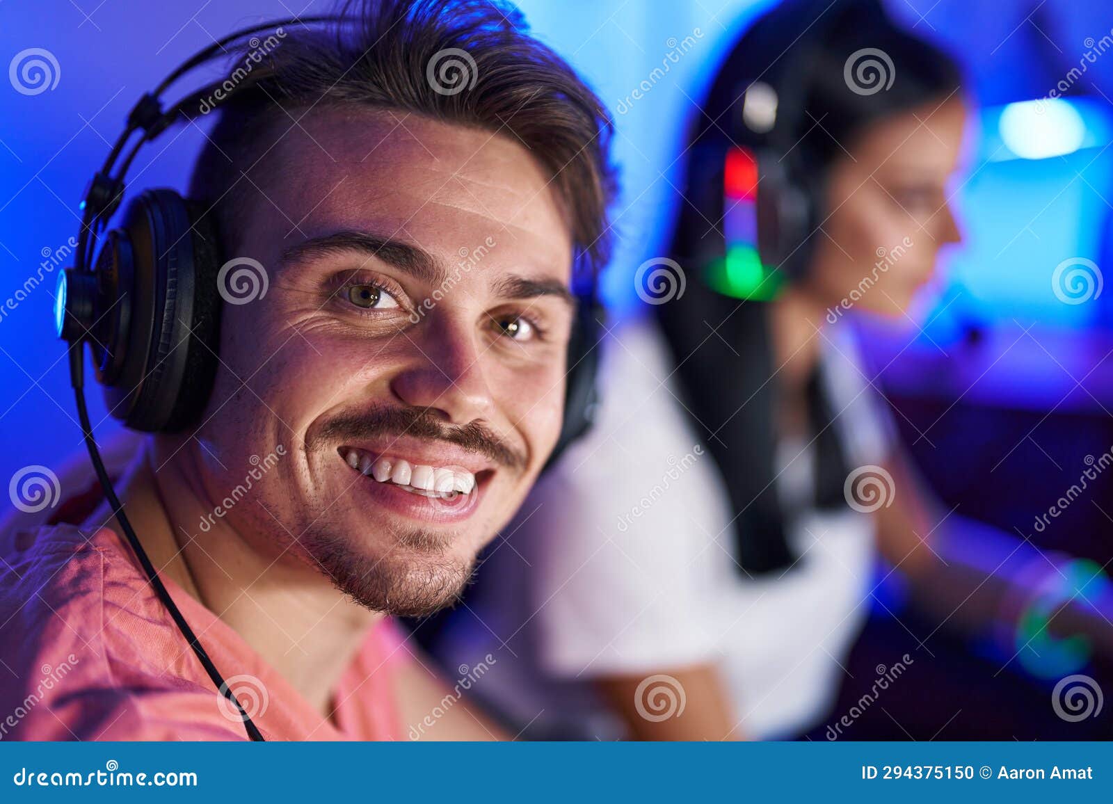 Man and Woman Streamers Playing Video Game Using Computer at Gaming ...