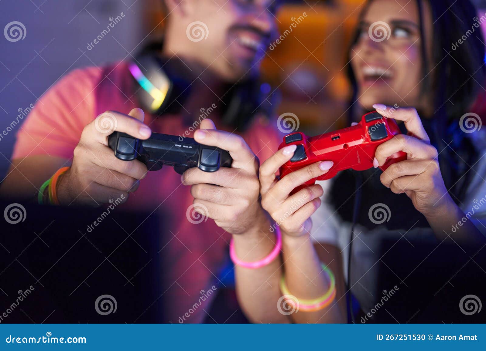 Man and Woman Streamers Playing Video Game Using Computer and Joystick ...