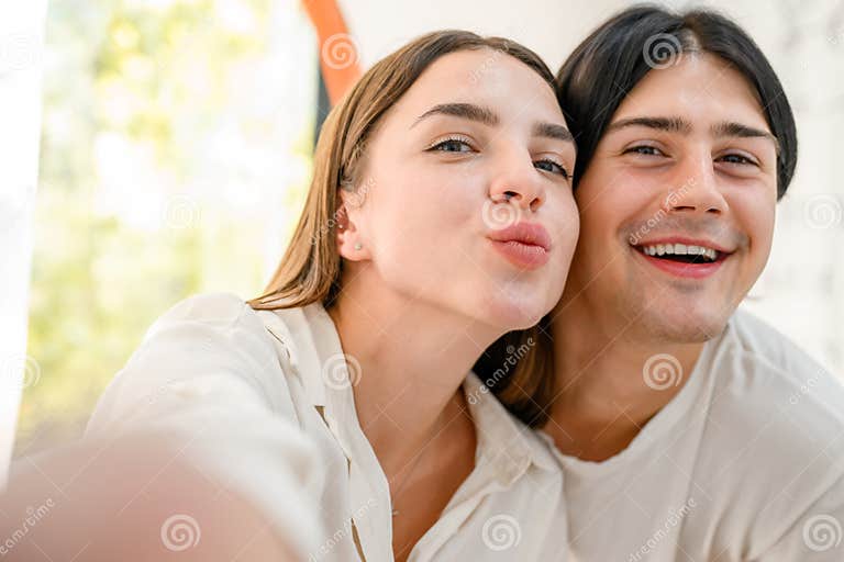 Man And Woman Taking Selfie Photos Together At Home Stock Image Image