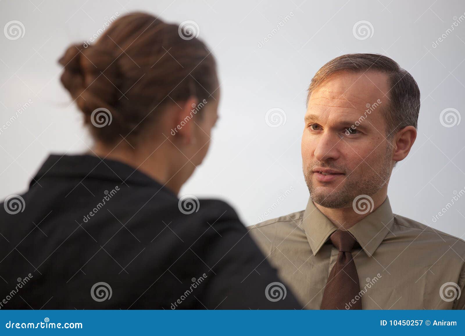 Man and woman talking stock image. Image of street, friend - 10450257