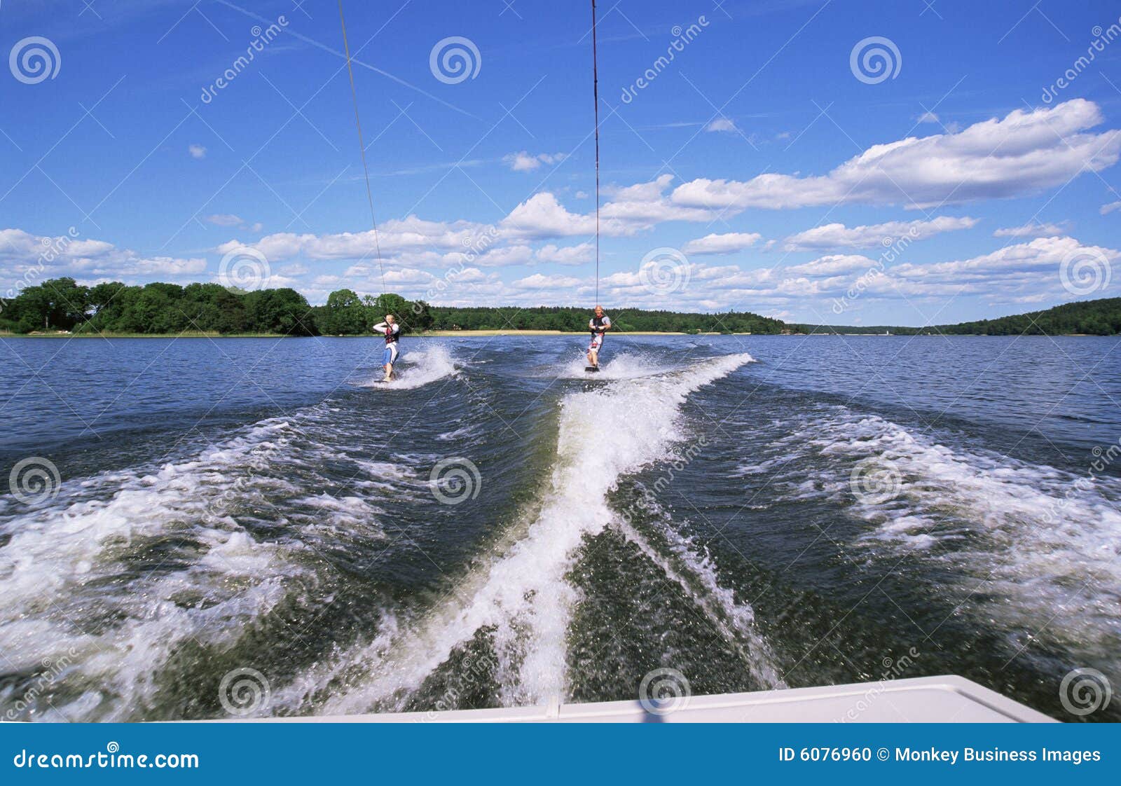 A Man and Woman Water-skiing Stock Photo - Image of adult, adventure ...