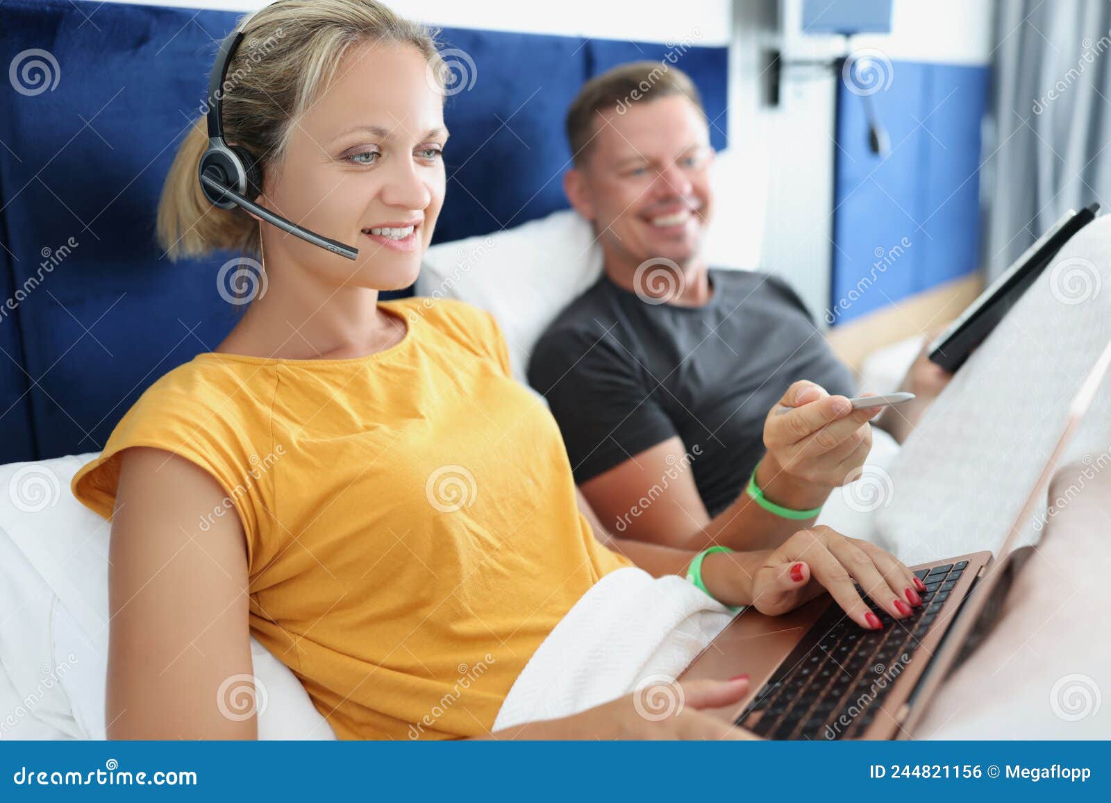 Man and Woman Work Remotely in Bed from Home Stock Photo - Image of ...