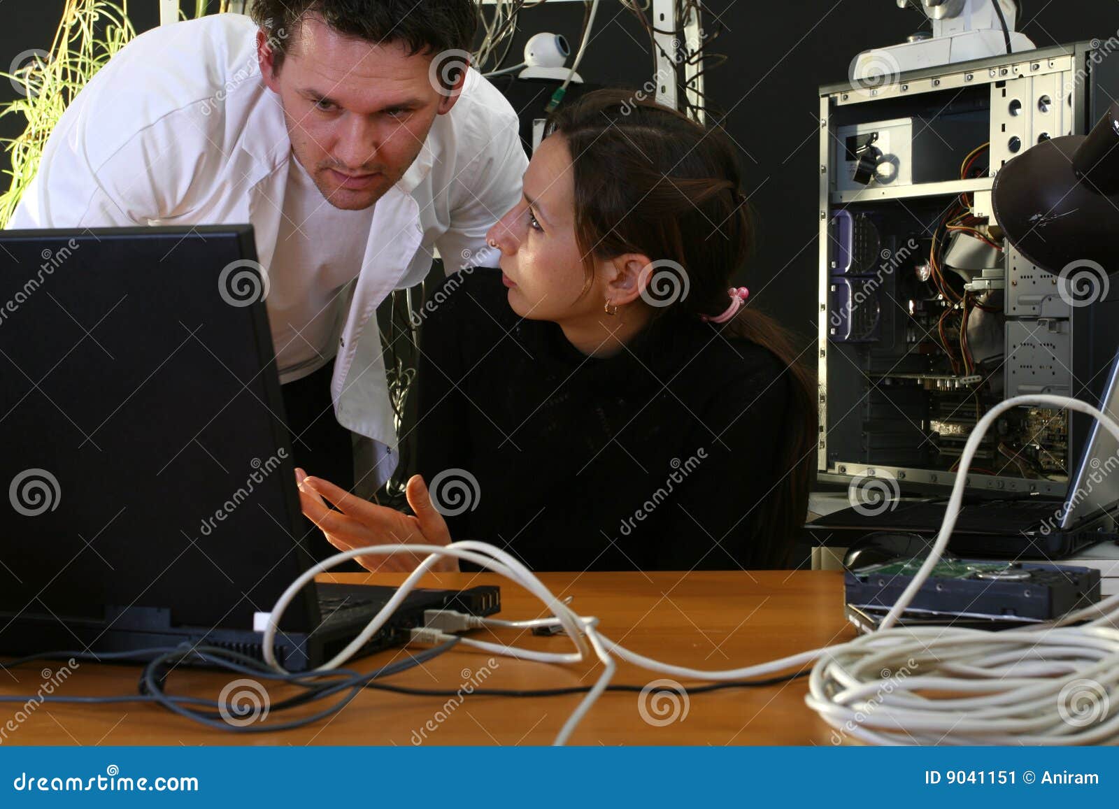 Man and Woman Working on Computer Stock Image - Image of cables, team ...