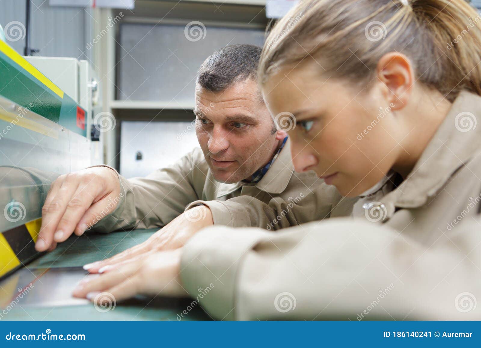 Man and Woman Working with Sheet Metal Stock Image - Image of laborer ...