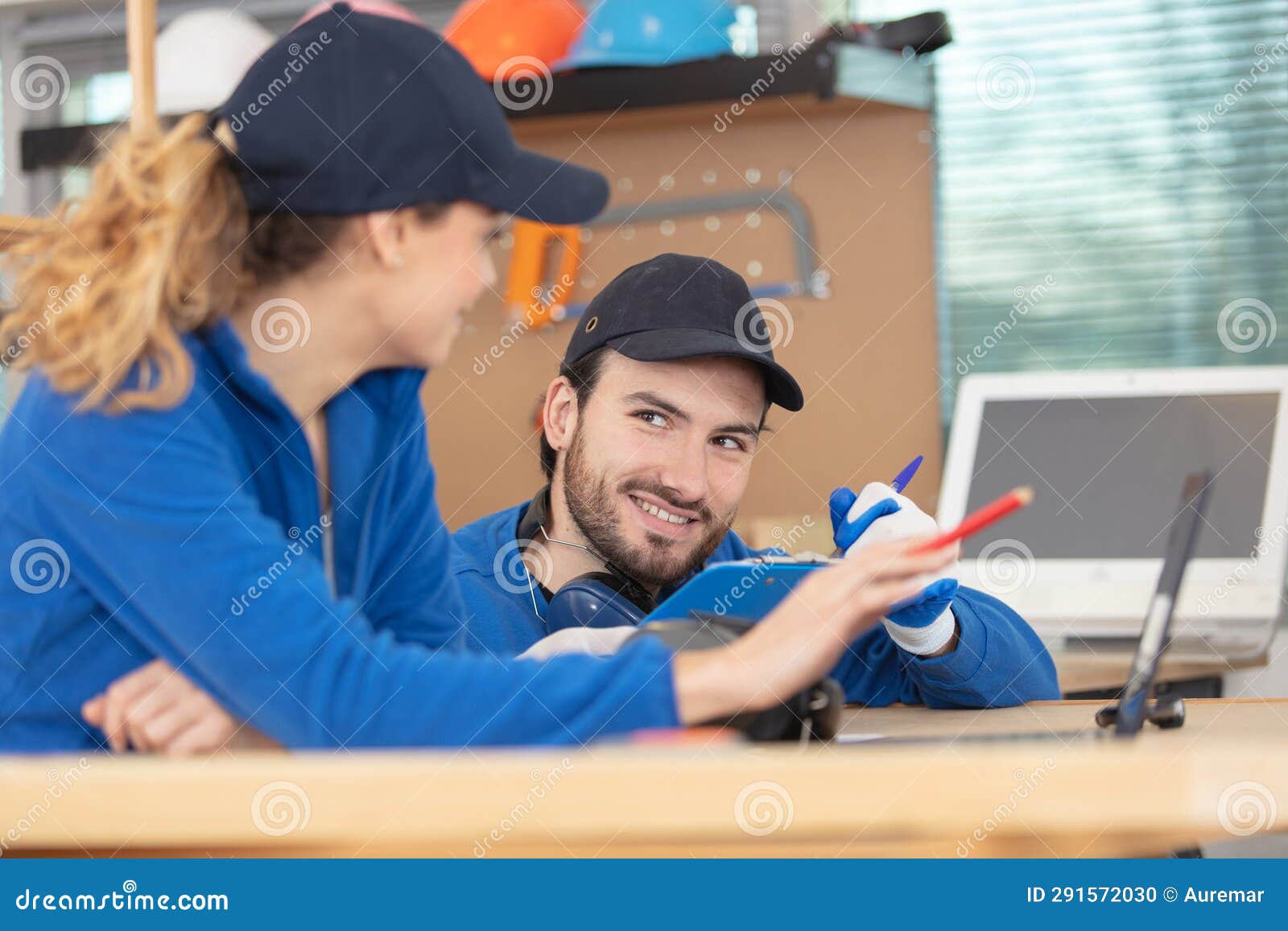 Man and Woman Working Together in Workshop Stock Photo - Image of ...