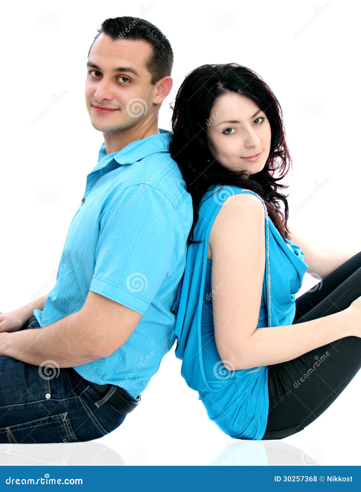 Man and Woman Sitting on Ground Stock Photo - Image of studio, face ...