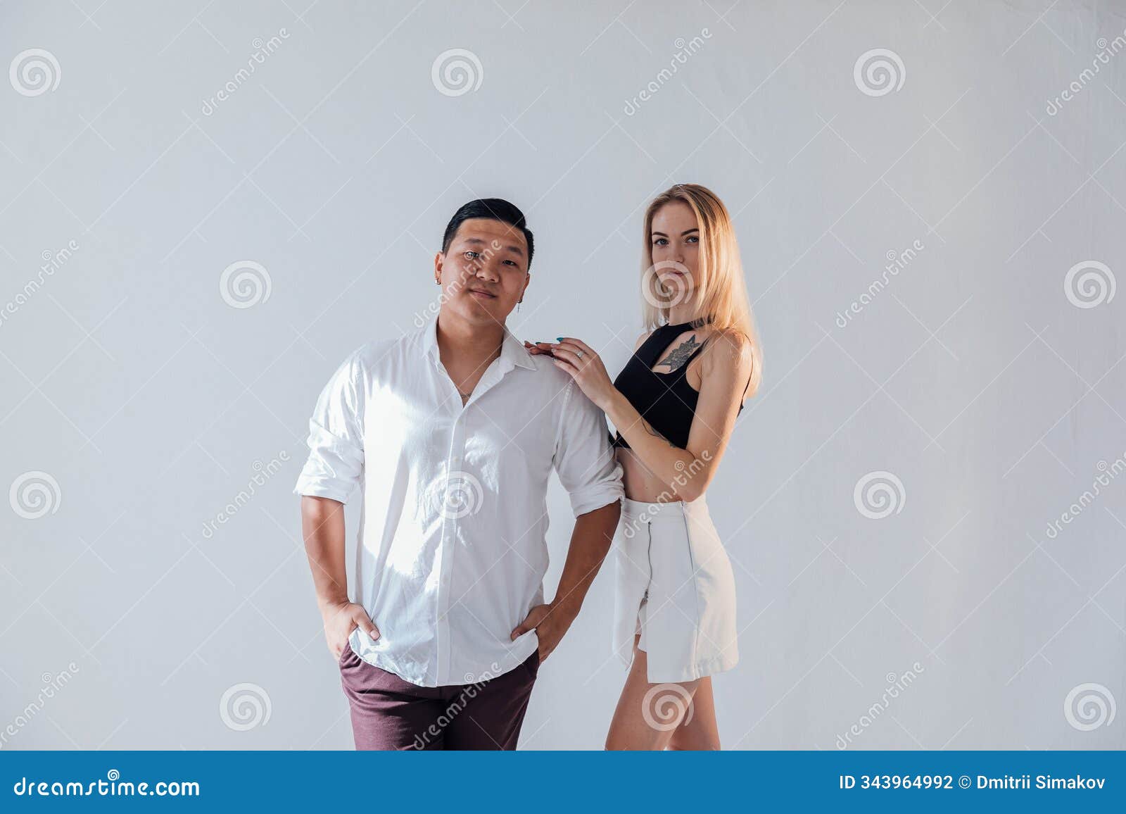 Man and Woman Standing Side by Side and Hugging Stock Photo - Image of ...