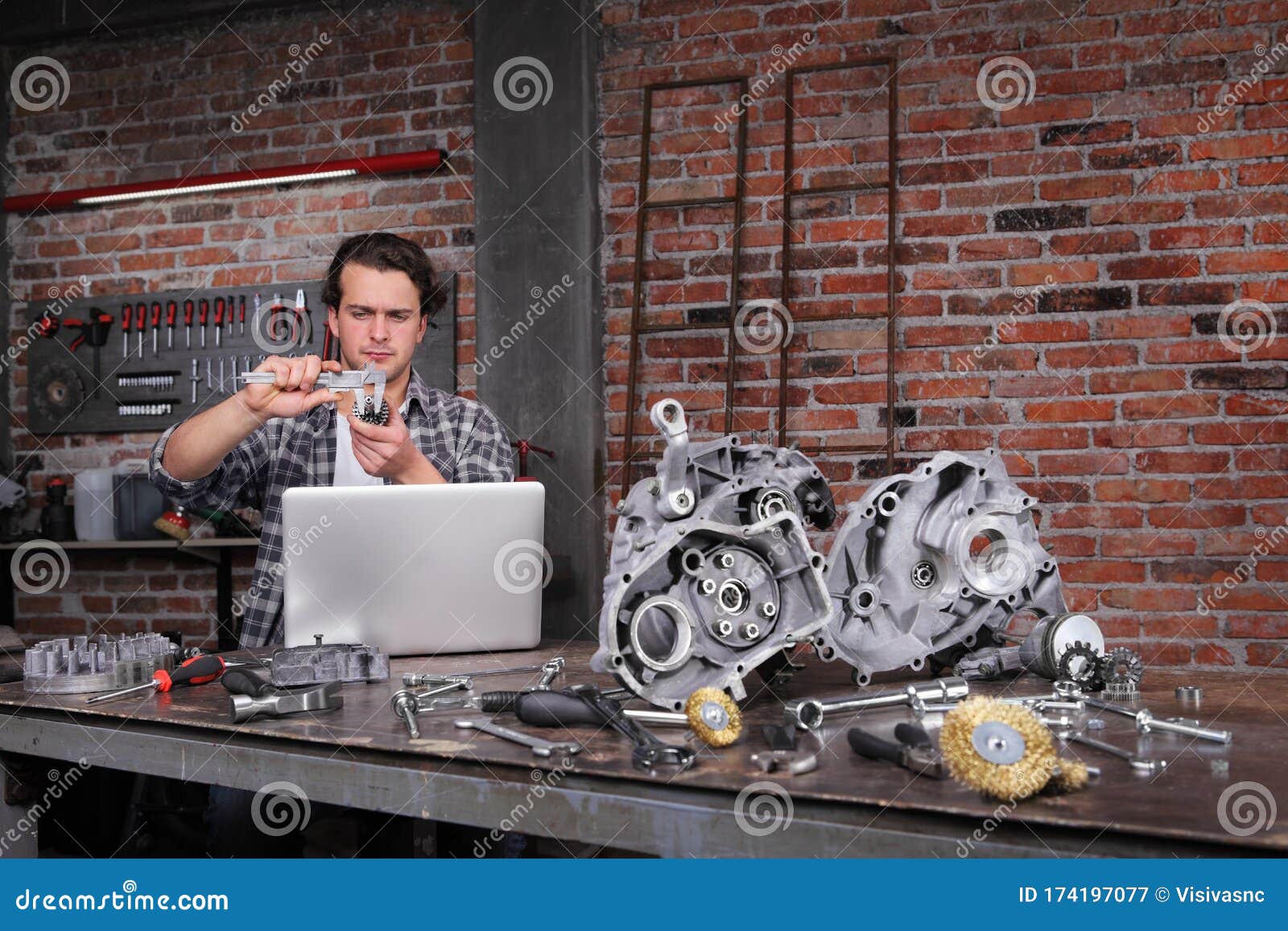 Man Work With Caliper Measure The Motor Gear, Repair And Cleaning ...