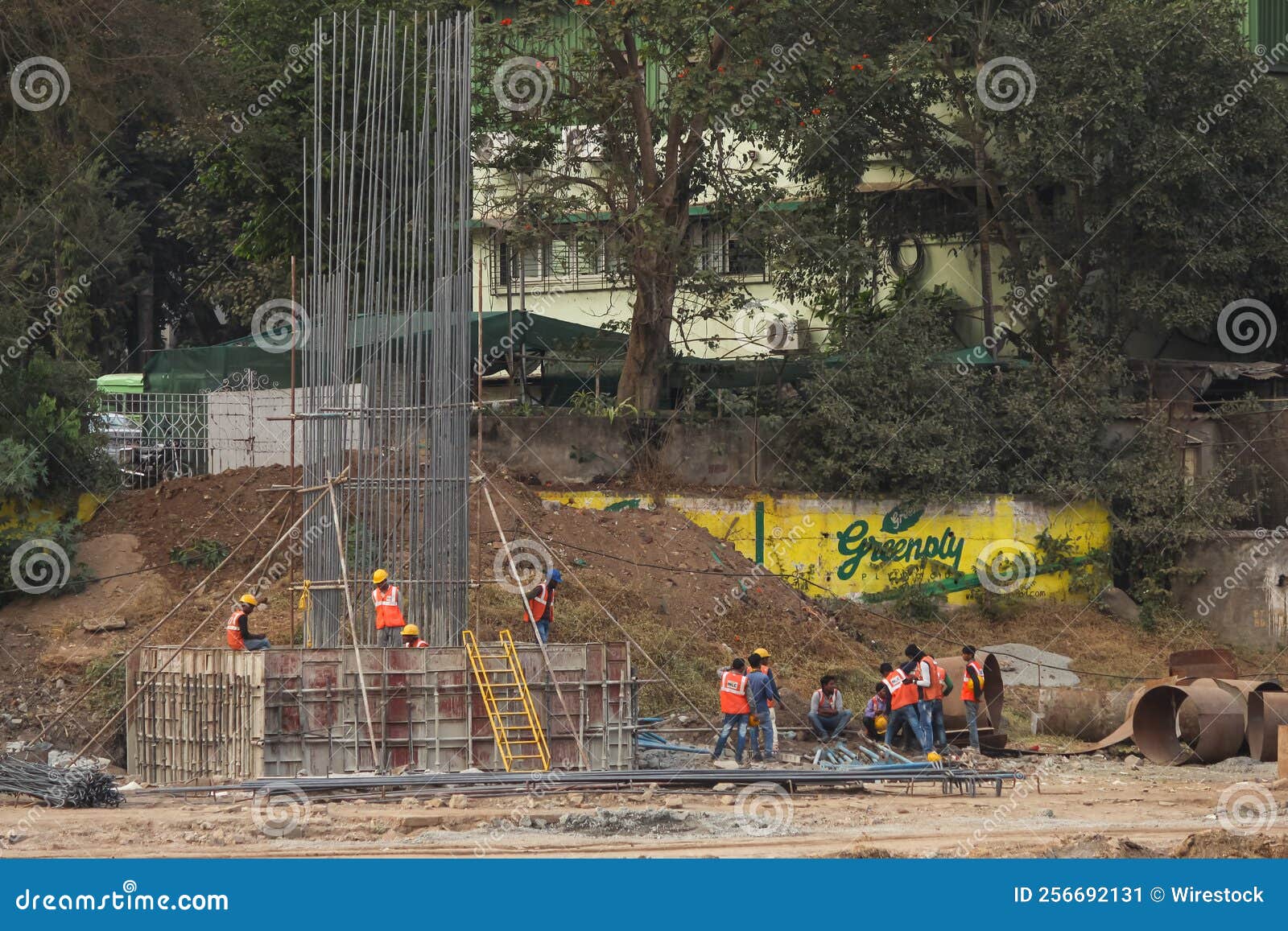 Workers Busy in Making Construction. Editorial Photo - Image of helmet ...