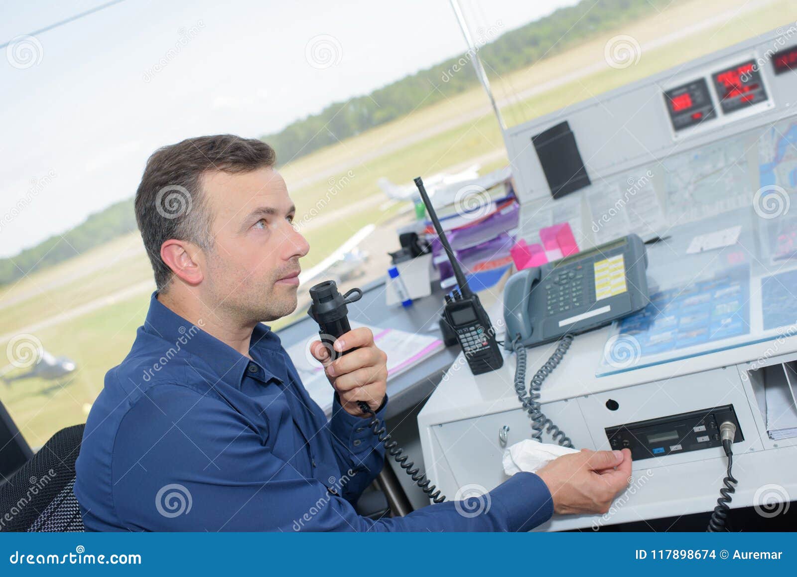Man at Work in Control Tower Stock Photo - Image of bandwidth, schedule ...