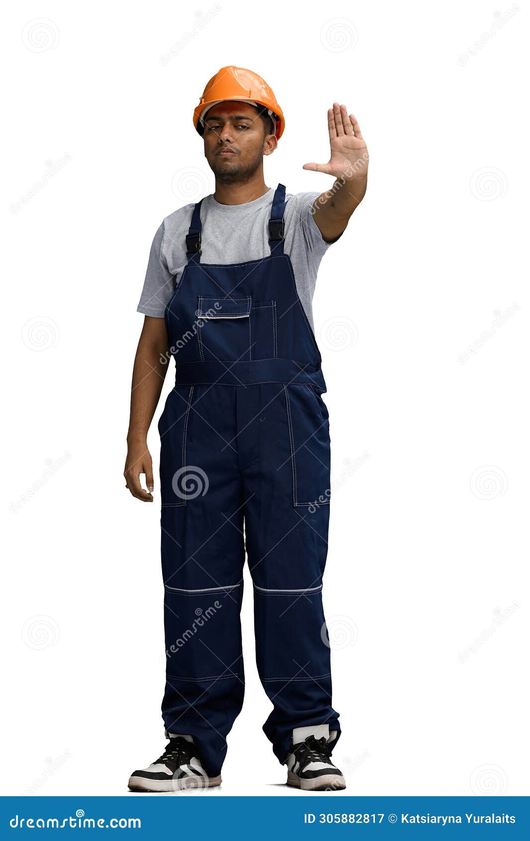 A Man in a Work Uniform on White Background Shows a Stop Sign Stock ...