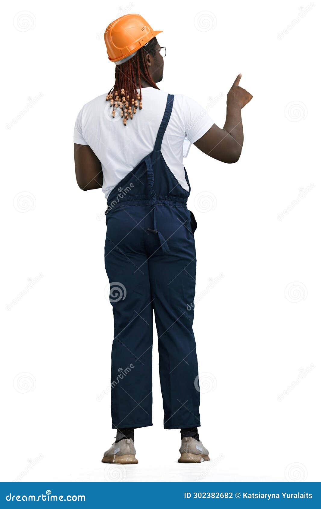 A Man in a Work Uniform, on a White Background, in Full Height, Points ...