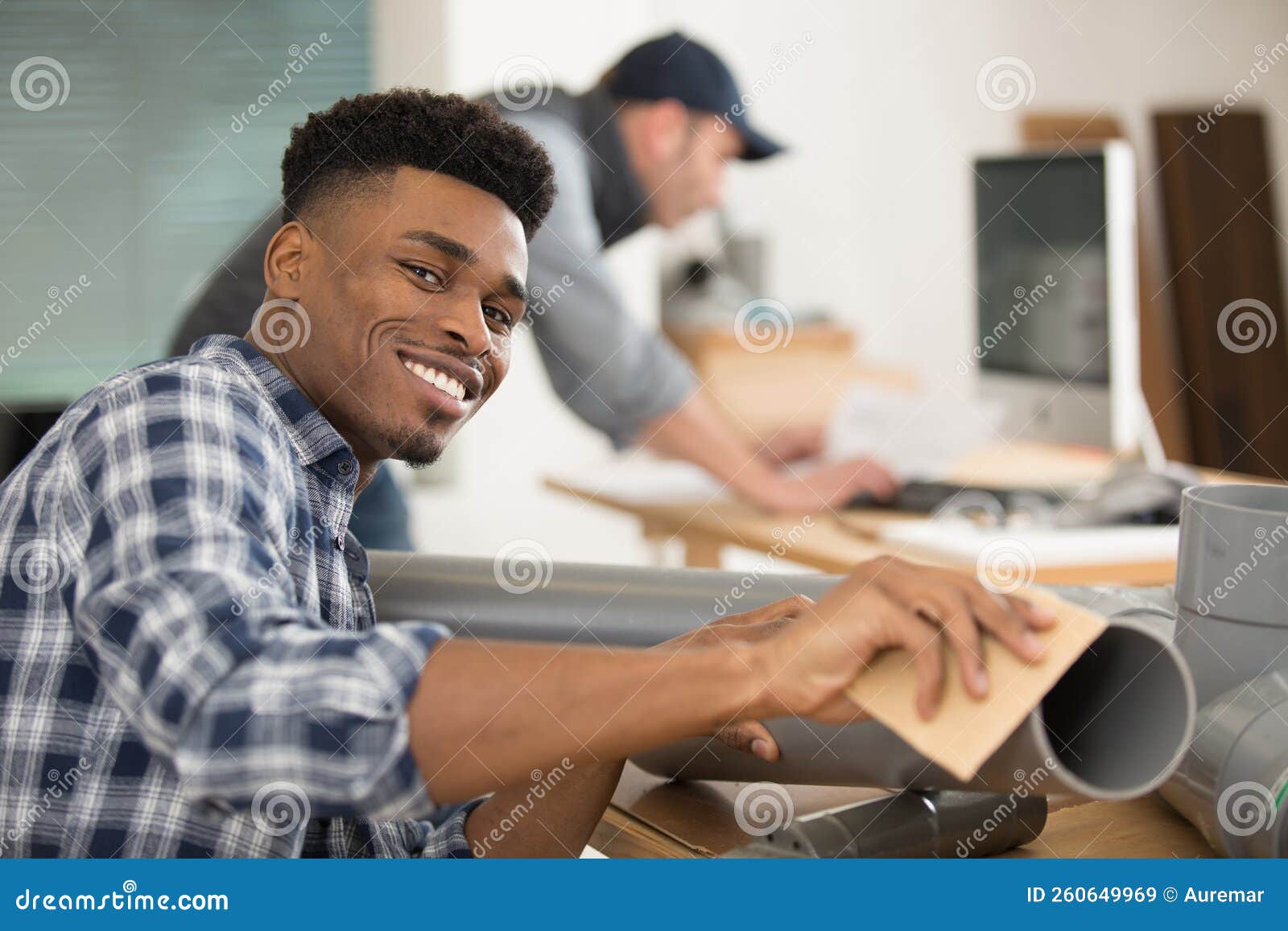 Man Work in Workshop with Sandpaper Sanding Surface Pipe Stock Image ...