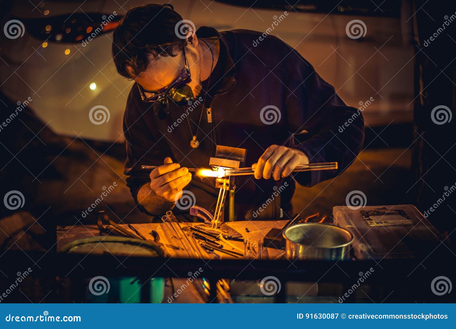 Man On Workbench Picture. Image: 91630087