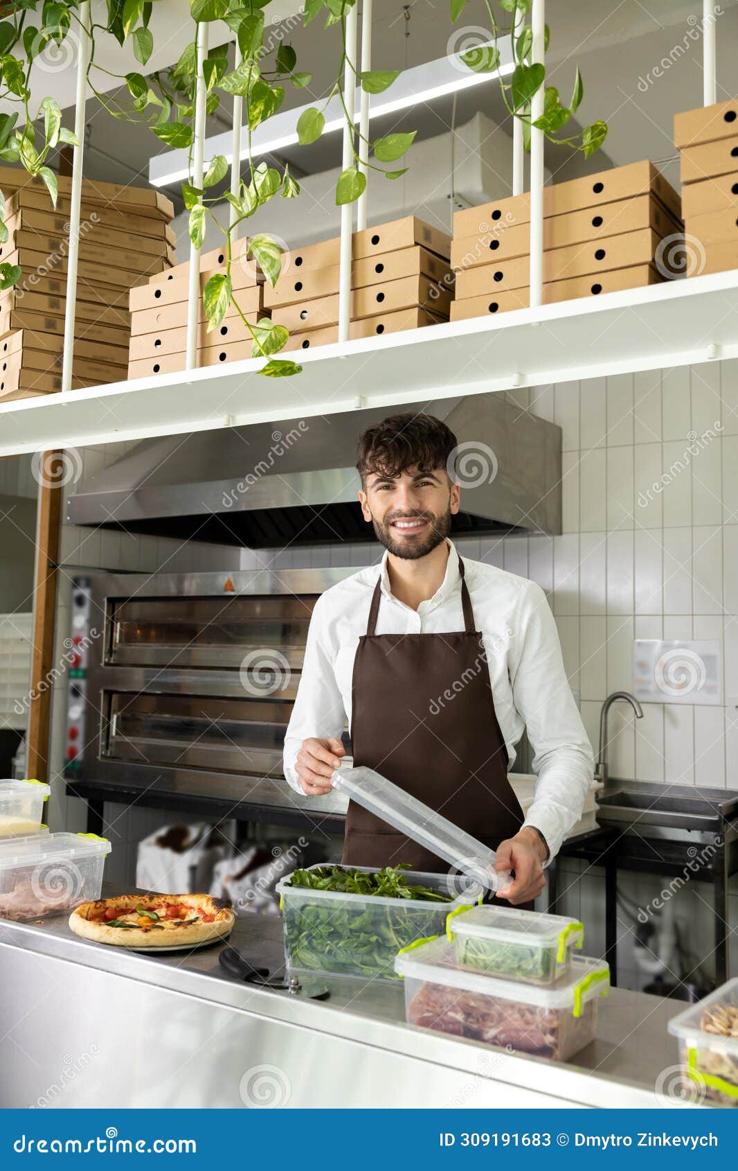 Man Worker at Cafe Kitchen Making Professional Pizza Stock Image ...