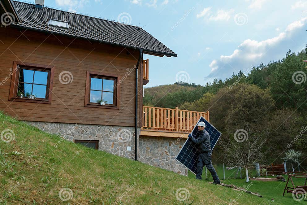 Man Worker Carrying Solar Panel for Installing Solar Modul System on ...