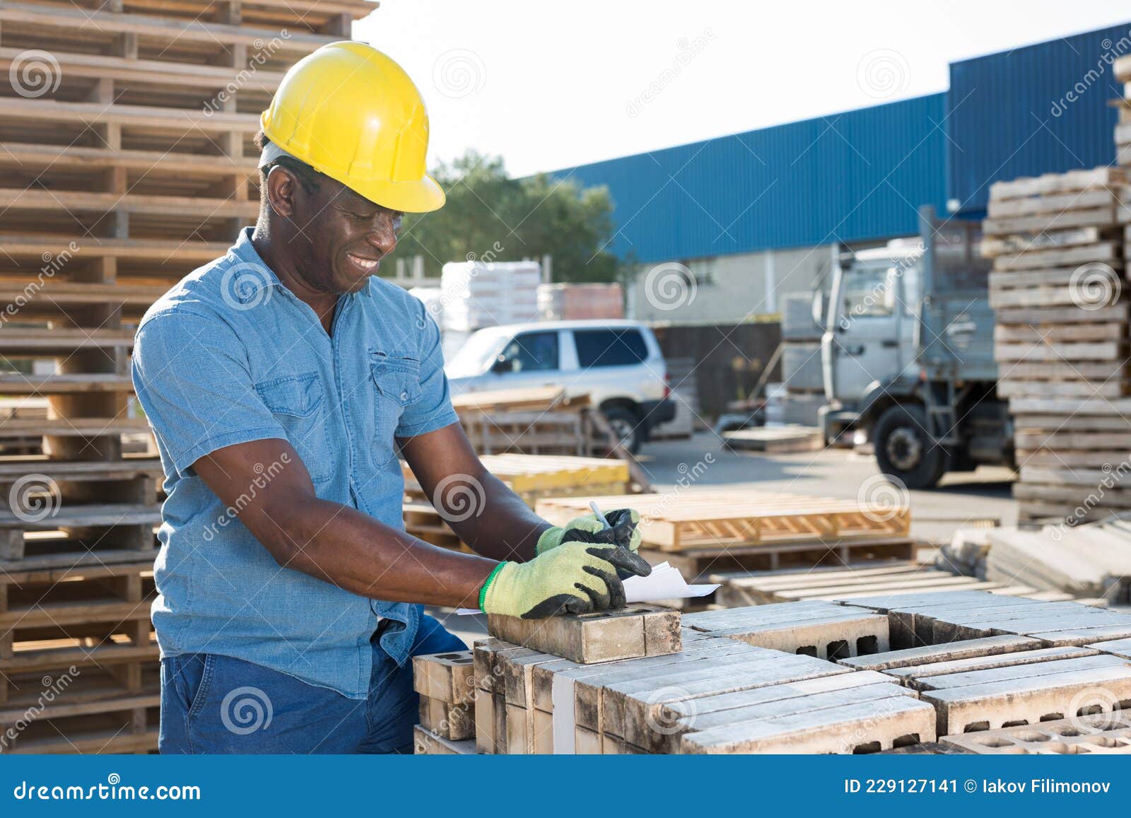 Man Worker Controlling Quantity of Bricks at Hardware Store Stock Image ...