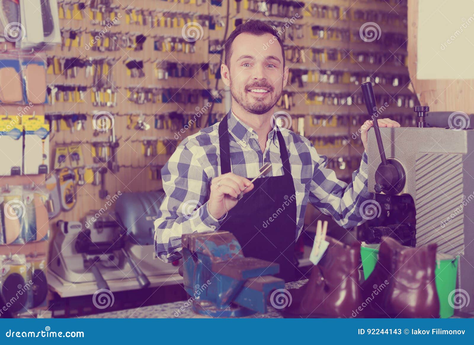 Man Worker Demonstrating His Tools for Making Keys Stock Image - Image ...