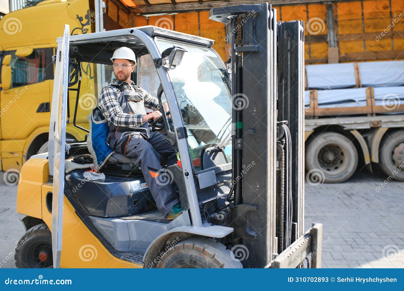Man Worker at Forklift Driver Happy Working in Industry Factory ...