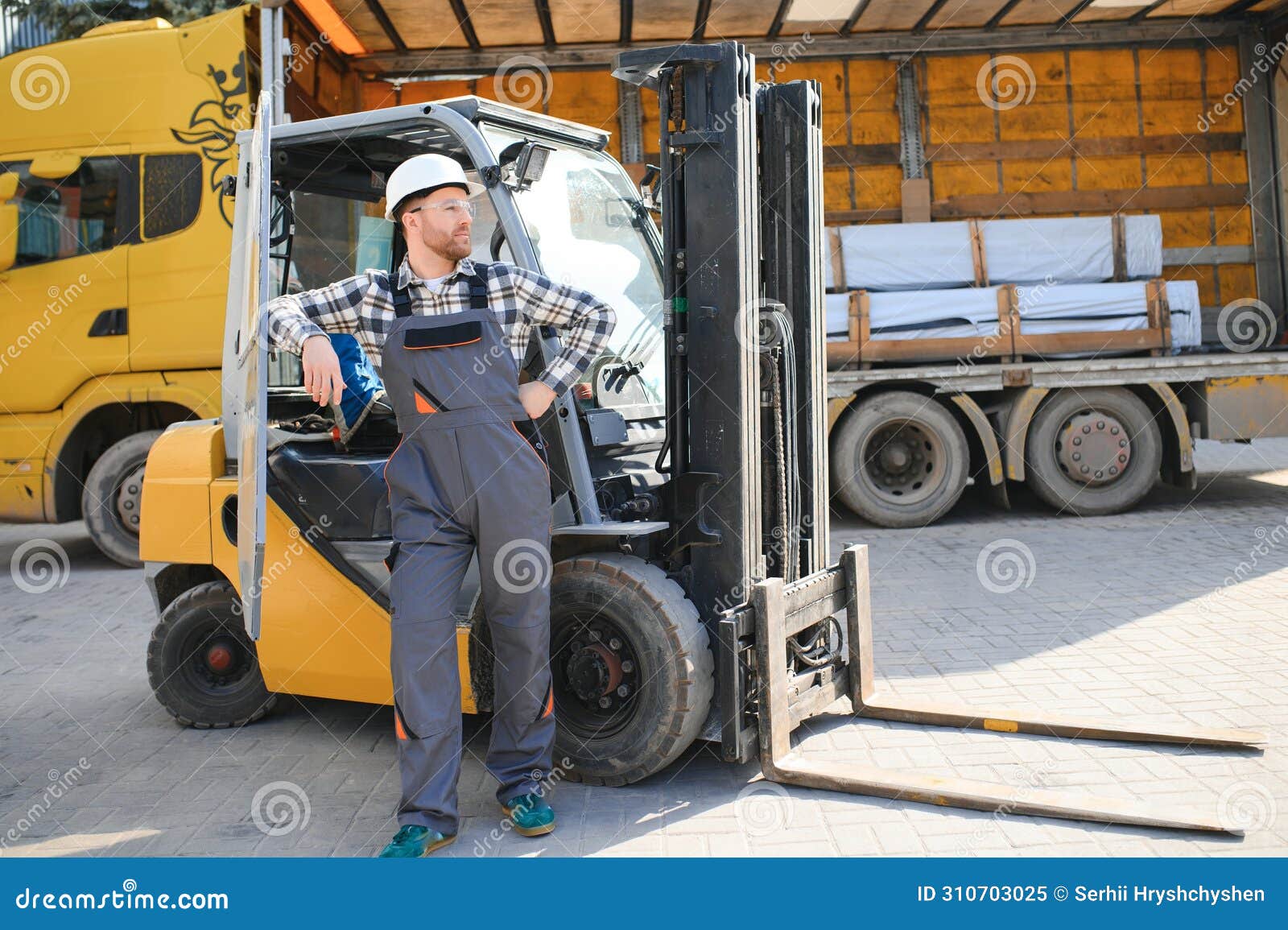 Man Worker at Forklift Driver Happy Working in Industry Factory ...