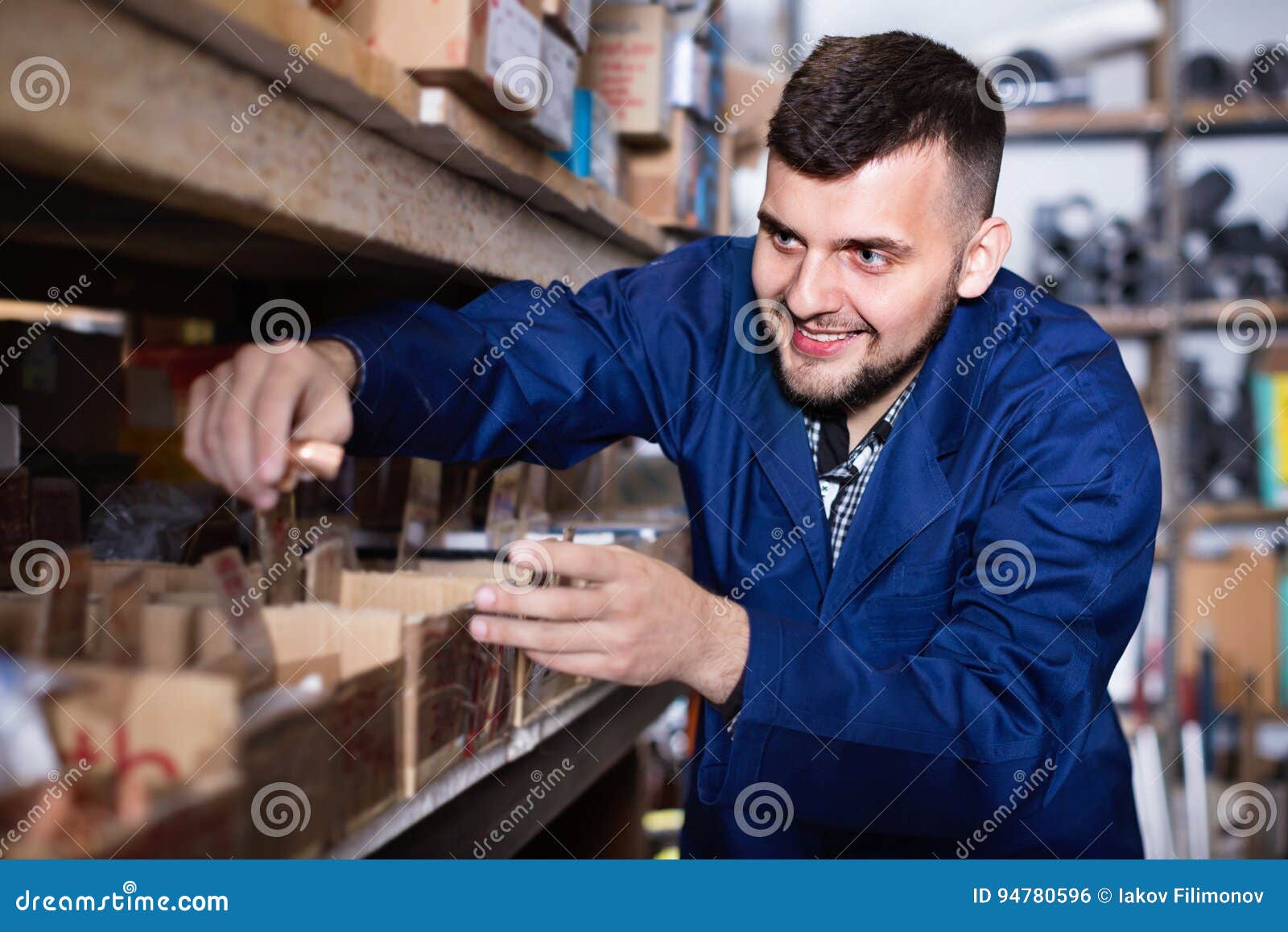 Man Worker Going through Sanitary Engineering Details in Workshop Stock ...