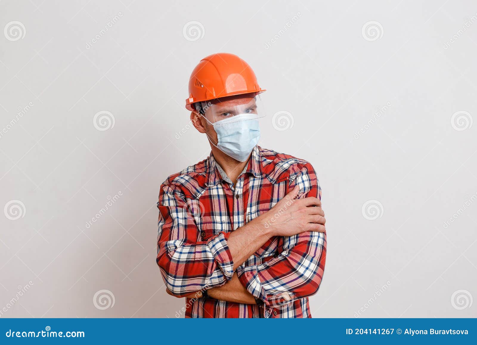 Man in a Worker`s Protective Helmet and Mask Stock Image - Image of ...