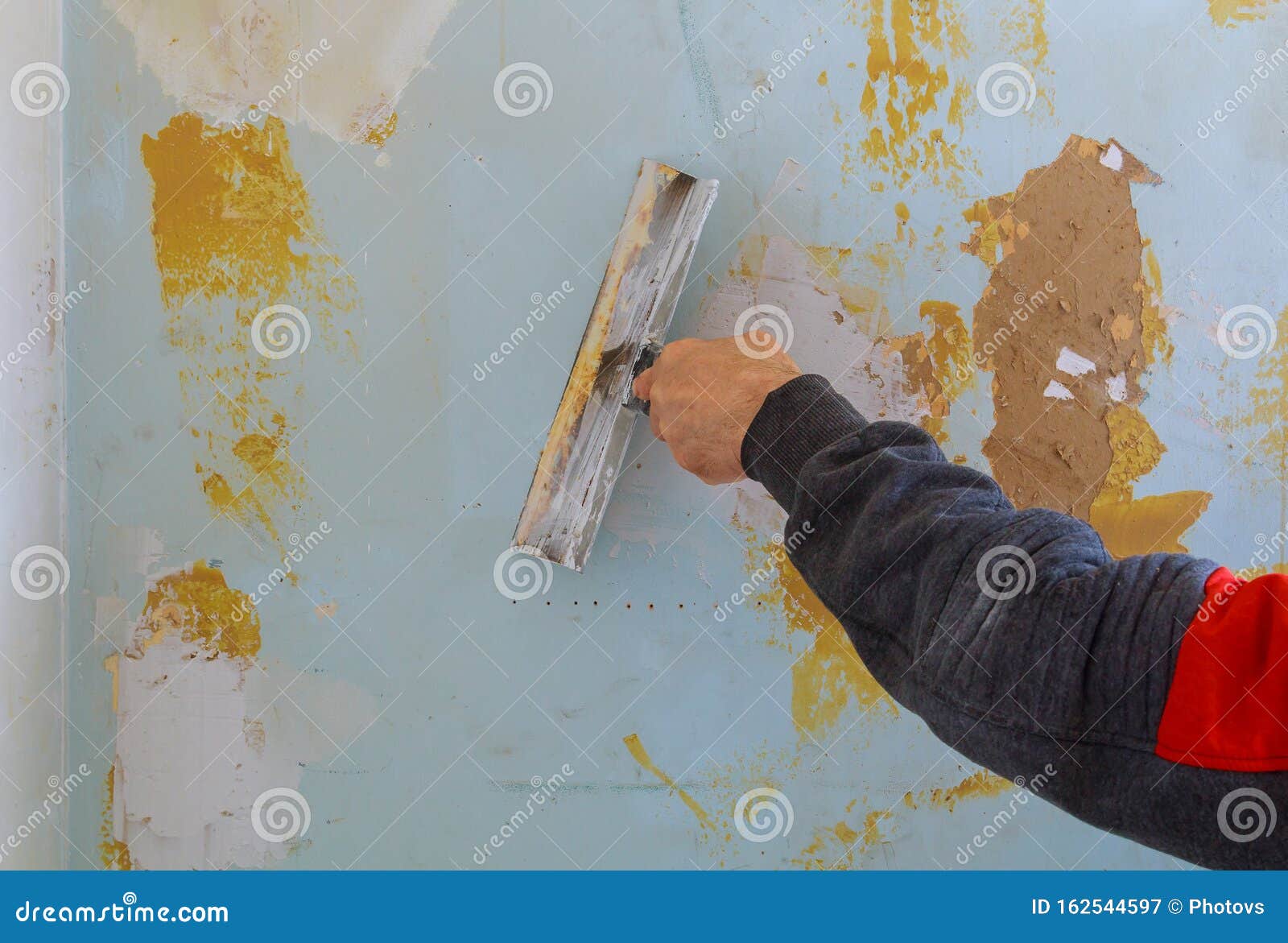 Man Worker Using Builders First Layer of Putty for Wall Stock Image ...