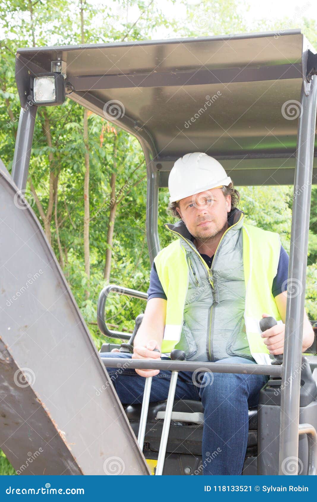 Man Worker Using Digger in Construction Site Stock Image - Image of ...