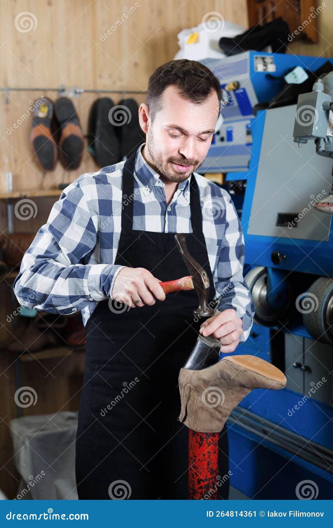 Man Worker Using Instruments for Fixing in Shoe Repair Stock Image ...