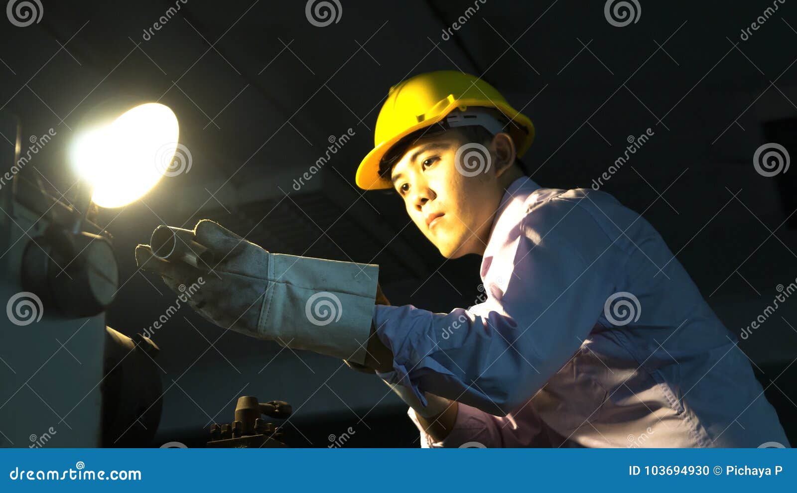 Man Worker is Working with the Machine,in Low Light Stock Photo - Image ...
